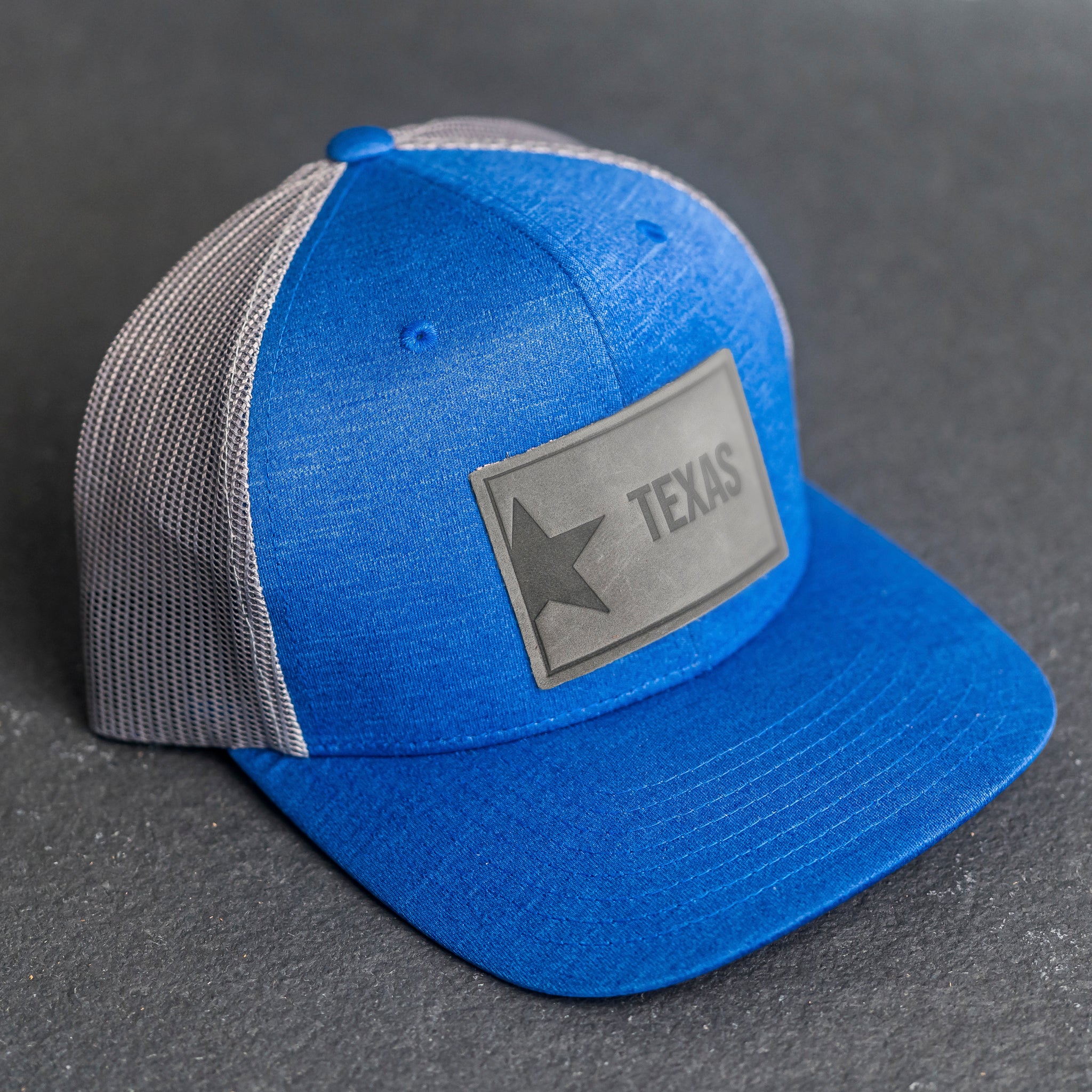 Leather Patch Performance Style Trucker Hat - Texas License Plate Stam